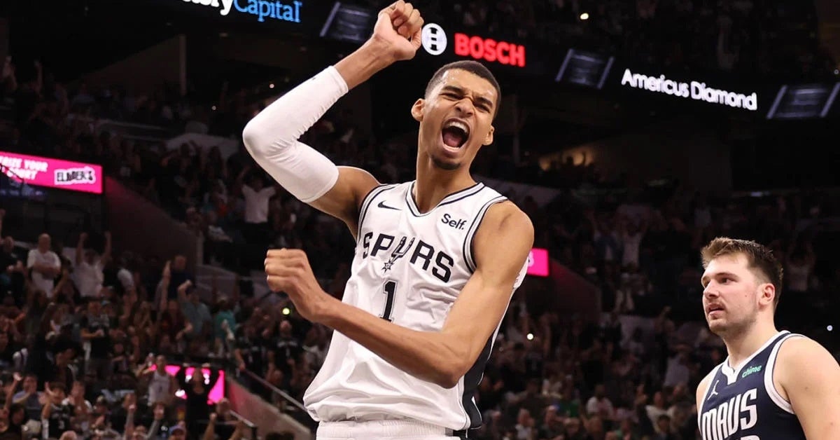 Victor Wembanyama reacts to his jersey hitting the auction block after swapping jerseys with kid ...