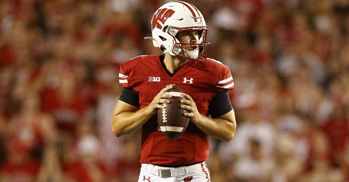 Backup quarterback Chase Wolf suffers torn meniscus, could miss entire ...