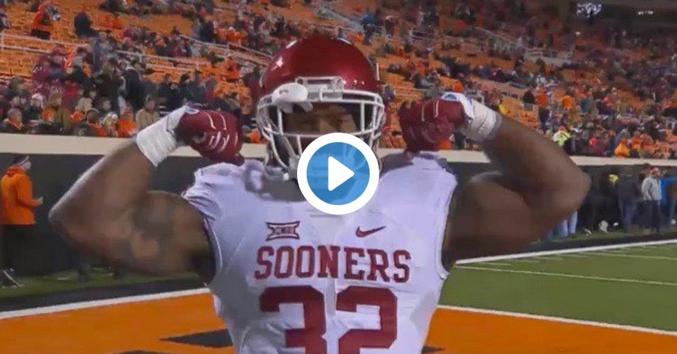 Watch: Oklahoma's Samaje Perine runs over everyone in video