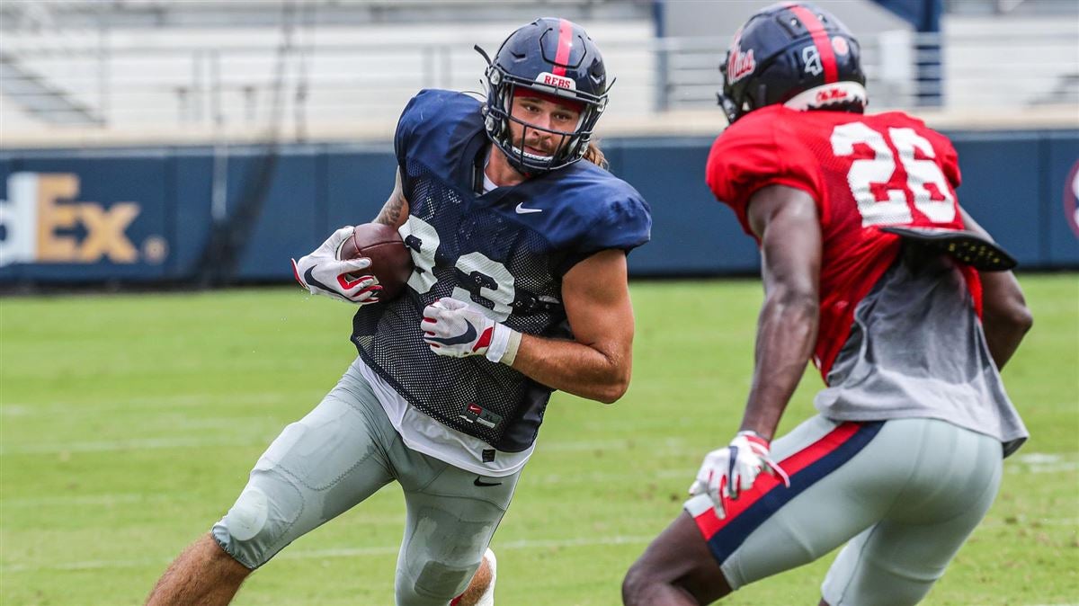 Tight end Chase Rogers doesn't mind putting his hand in the dirt