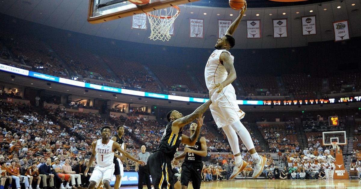 Texas center Cameron Ridley continues to work his way back