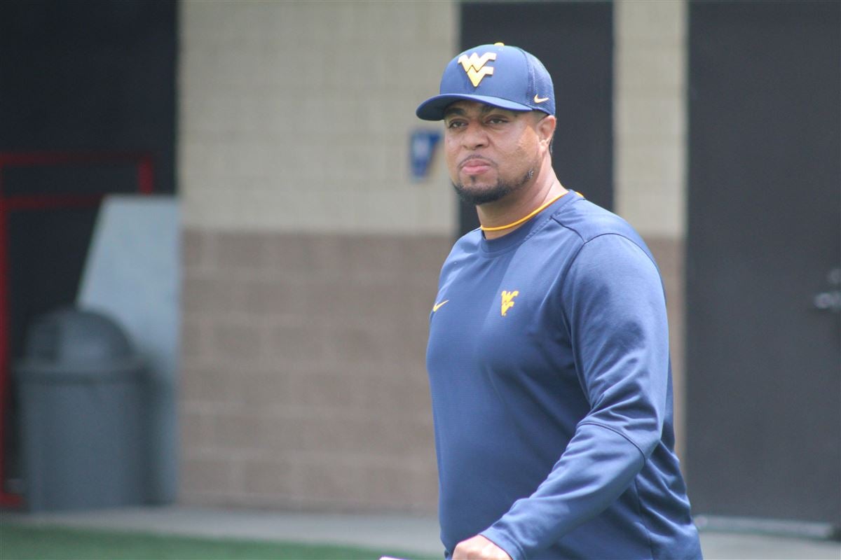 WVU working on football staff, renews top assistant on defense