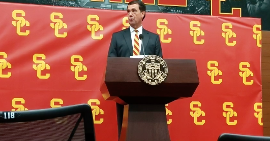 LOOK: USC AD Mike Bohn meets with fan wearing 'Hire Meyer' shirt