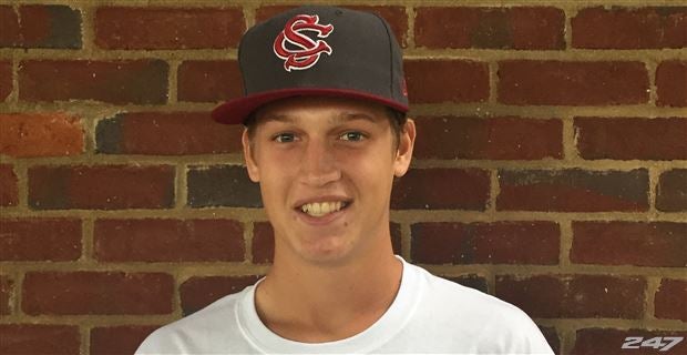 Top arm decommits from Carolina