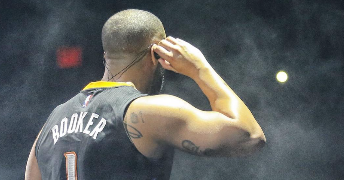 Drake rocks Devin Booker jersey during concert in Phoenix