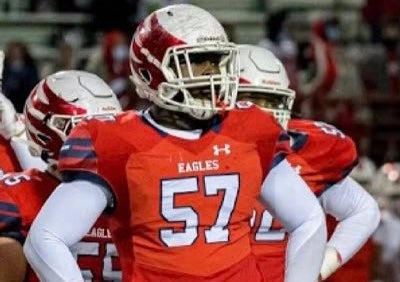 Gilles Tchio familiar with new Kansas OL coach Scott Fuchs