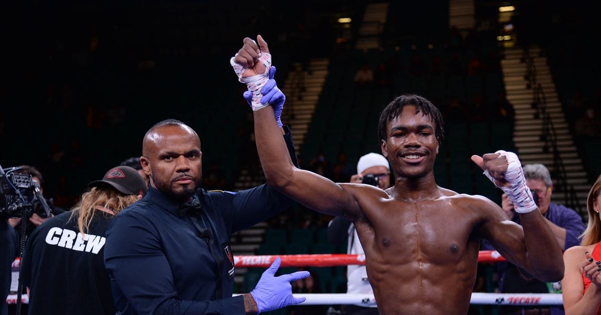 Evander Holyfield's son says dad is ready to fight Mike Tyson