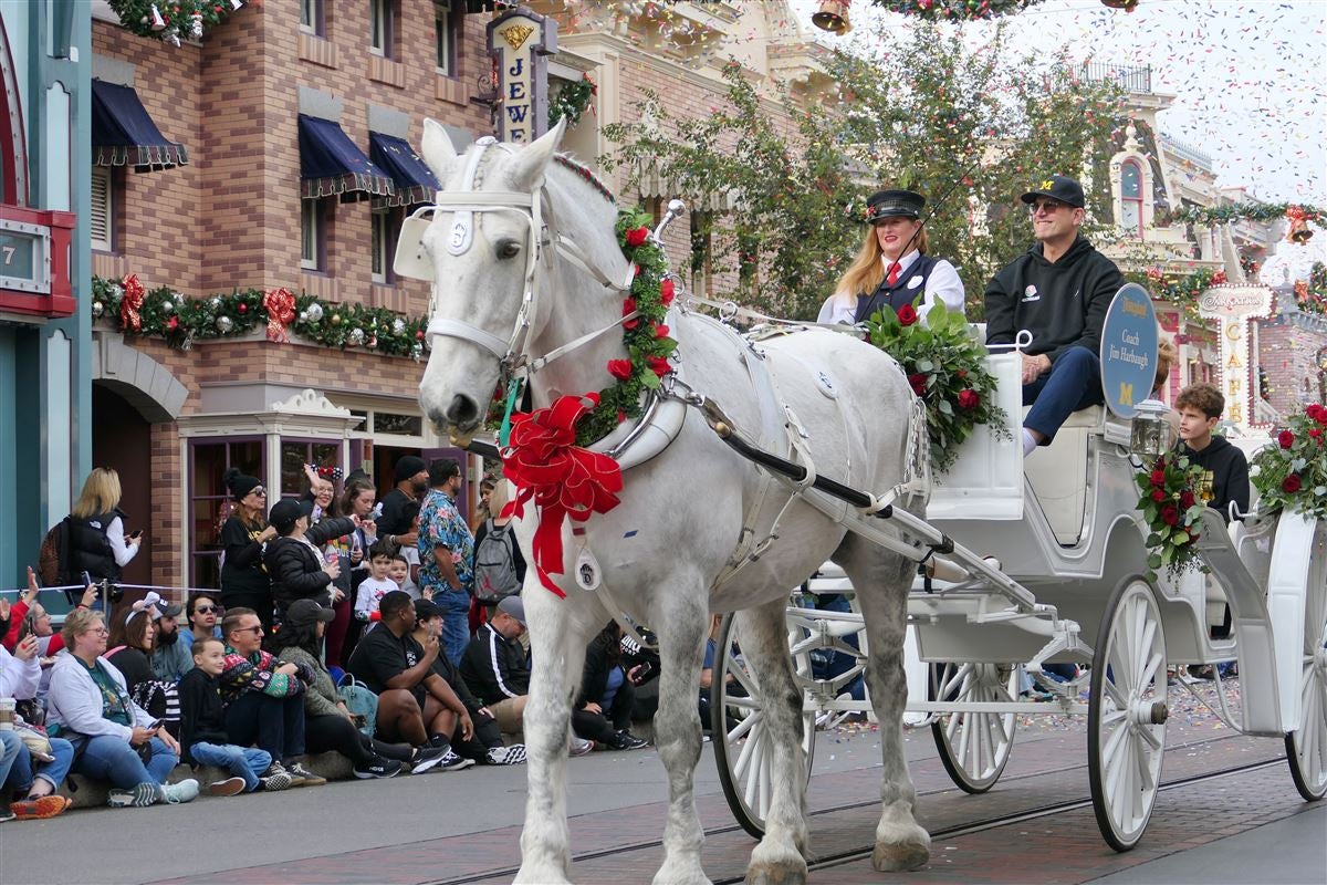 Watch: Michigan football receives parade down Main Street at Disneyland