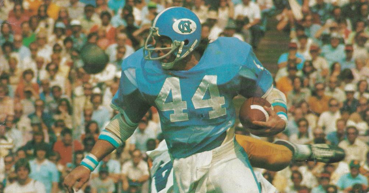 UNC football uniforms through the years.