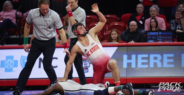 Photo Gallery: Wolfpack does its talking on the mat, slaughters Heels