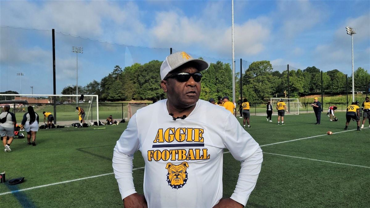 Coach Sam Washington addresses the press at N.C. A&T's first practice