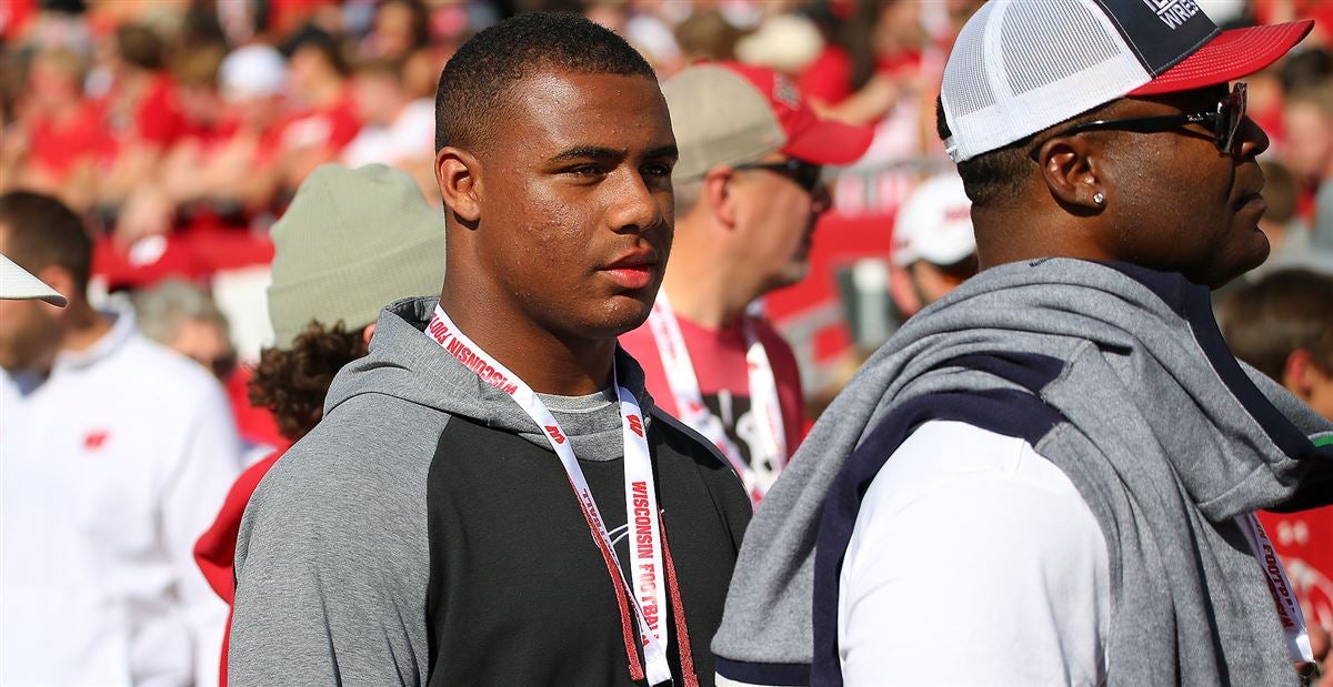 Dillan Johnson still torn between football, wrestling