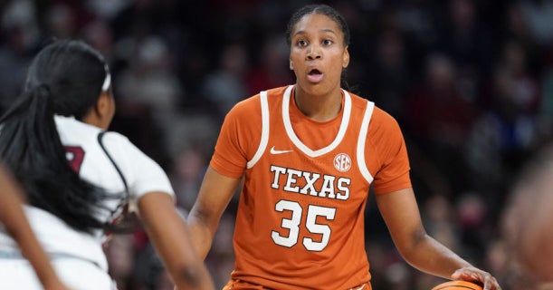 Booker scores 28 as No. 7 Texas routs No. 8 Maryland 89-51 in Coretta ...