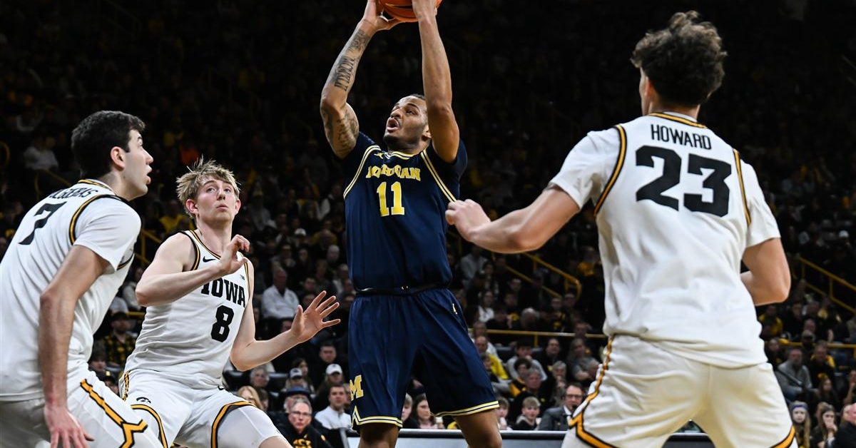 Late defensive stops help Michigan survive scare at Iowa, set records ...