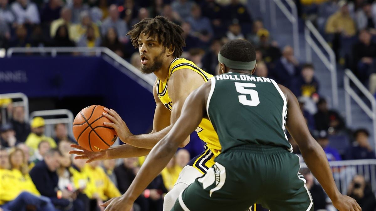Walker, Hall lead Michigan State over rival Michigan in Ann Arbor