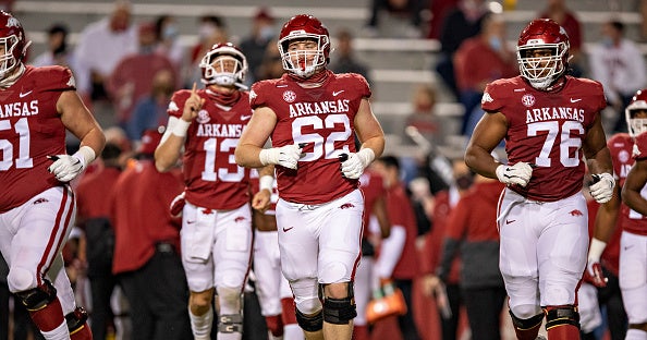 Arkansas offensive line sponsored by local BBQ restaurant - Tar Heel ...