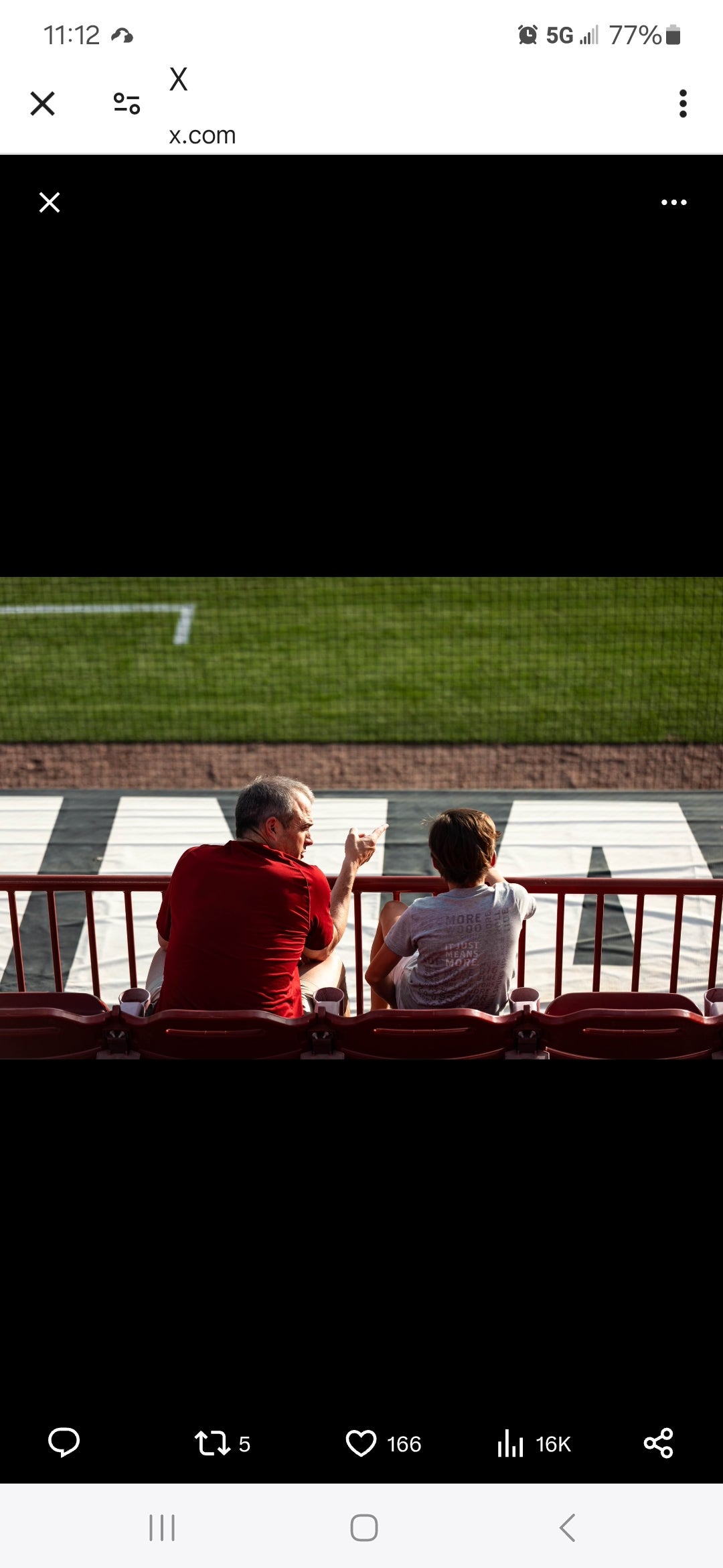 Coach Beamer & son at softball game