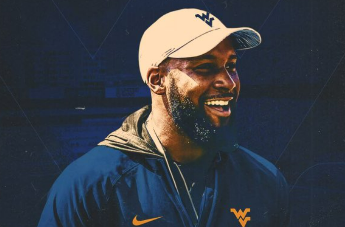 How is Tony Washington adjusting as new WR coach?