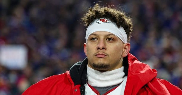 Kermit the Frog puppet dressed as Patrick Mahomes hung by Bills fans