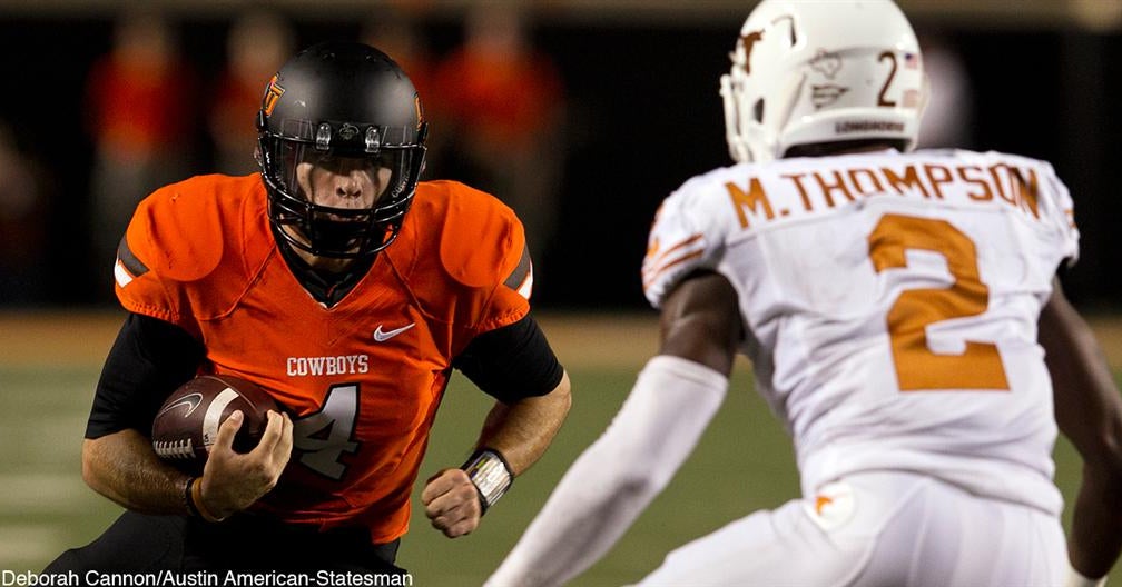 Texas hires former Oklahoma State QB J.W. Walsh as analyst