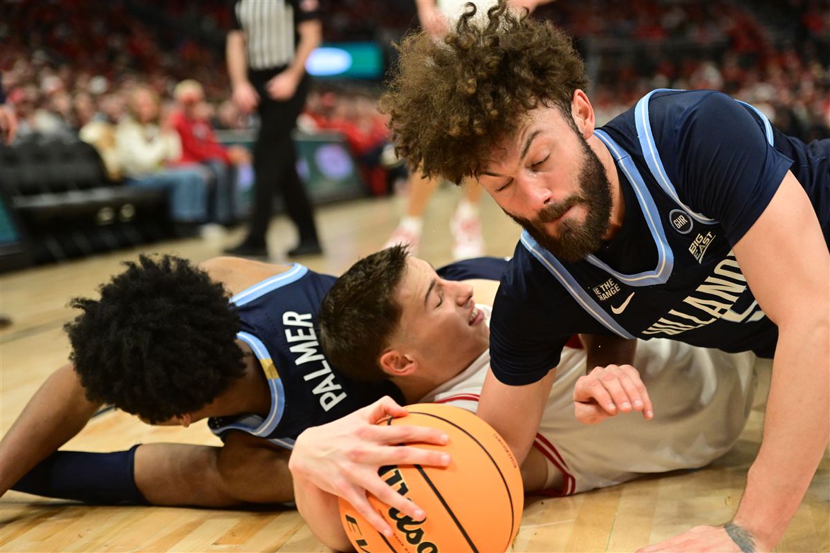 'Nova overwhelms Wisconsin in overtime to earn a key win, 76-66