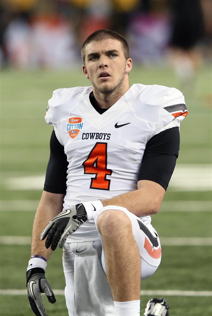 Texas hires former Oklahoma State QB J.W. Walsh as analyst
