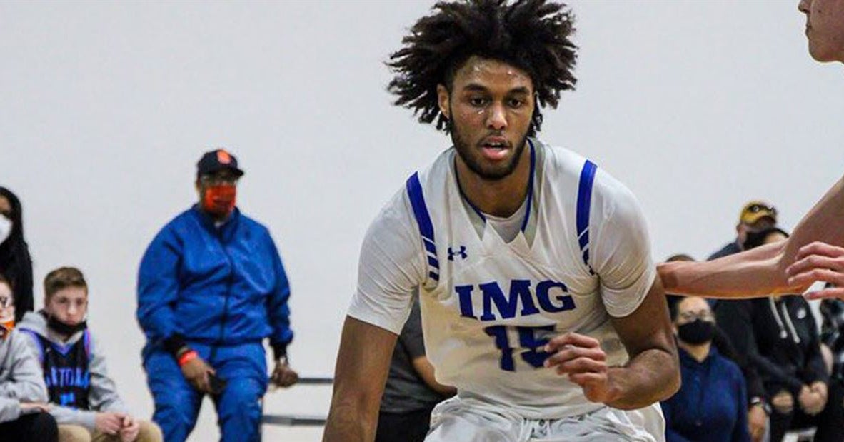 Senior Seven-Footer Efton Reid Listening to Hubert Davis, UNC