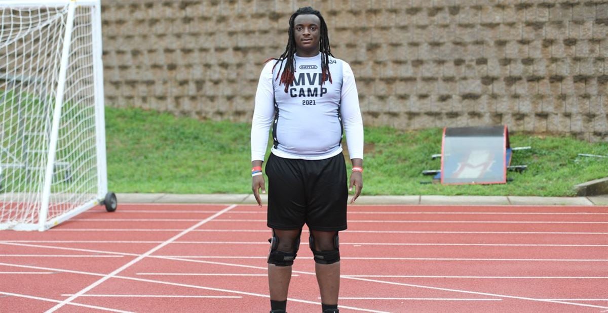 Virginia among those recruiting 2023 four-star OT Johnny Williams IV ...