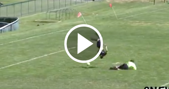 High school soccer player does a flip over the goalie, scores