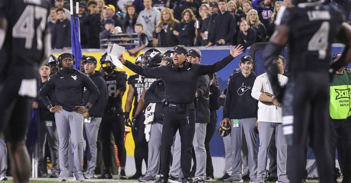 How does Neal Brown handle criticism?