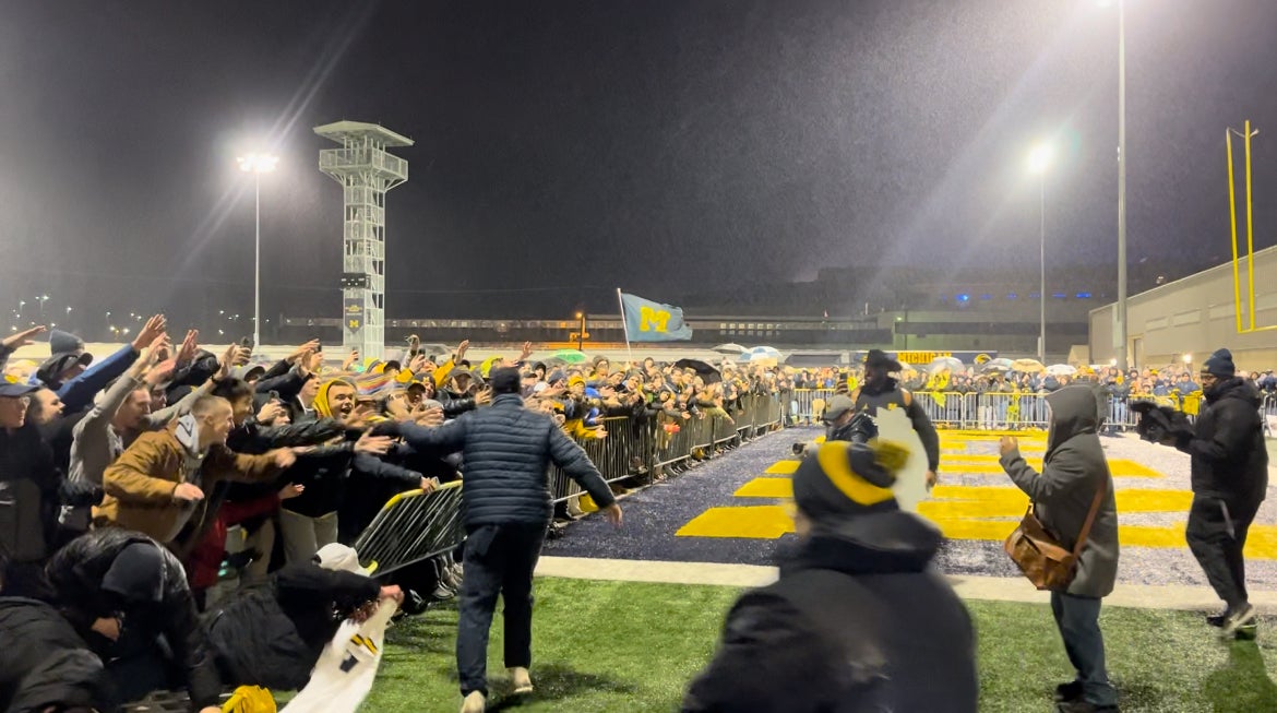 WATCH: Thousands of fans welcome back Jim Harbaugh, JJ McCarthy and ...