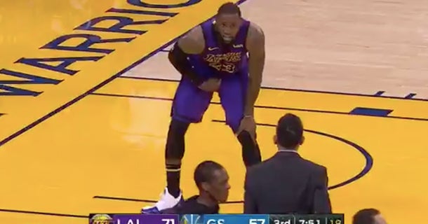 LeBron James suffers apparent groin injury vs. Warriors