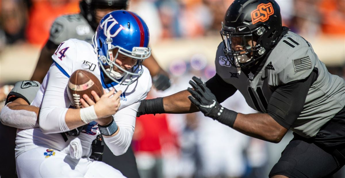 Podcast: KU football quarterback carousel returns in OSU loss