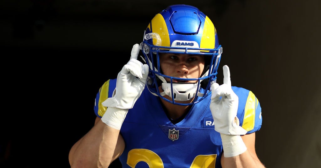 Super Bowl LVI: Rams RB Jake Funk poses with Lombardi Trophy, cigar in ...