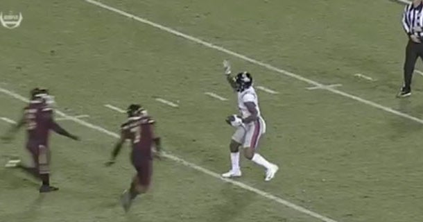 Ole Miss punt returner signals fair catch after catching punt