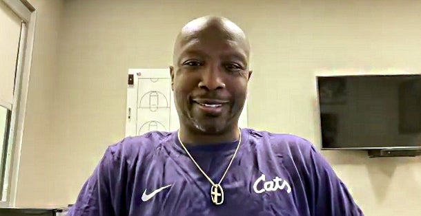 Kansas State assistant basketball coach Rodney Perry speaks to the ...
