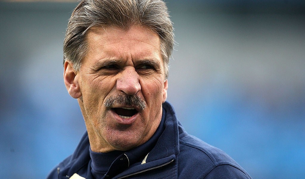 College football realignment not done yet, Dave Wannstedt says