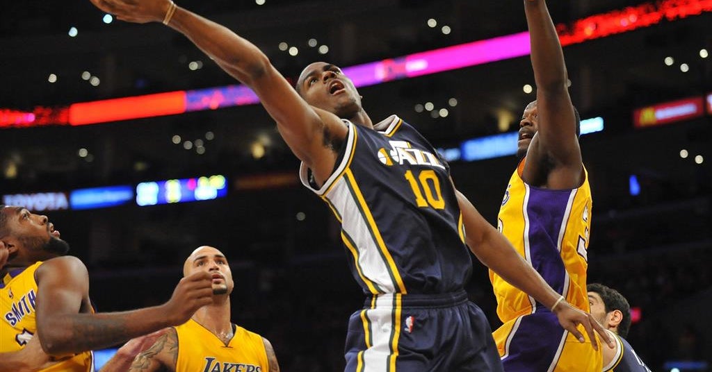 Alec Burks crosses up Kobe Bryant en route to a layup