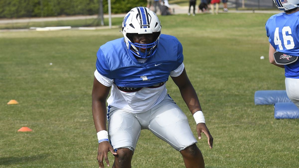 APP STATE CLOSES ON KEY DEFENSIVE END COMMIT