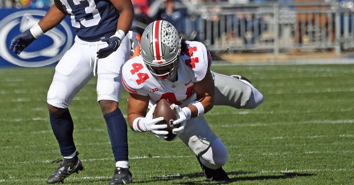Tuimoloau's huge day helps Buckeyes slip past Penn State 44-31 in B1G ...