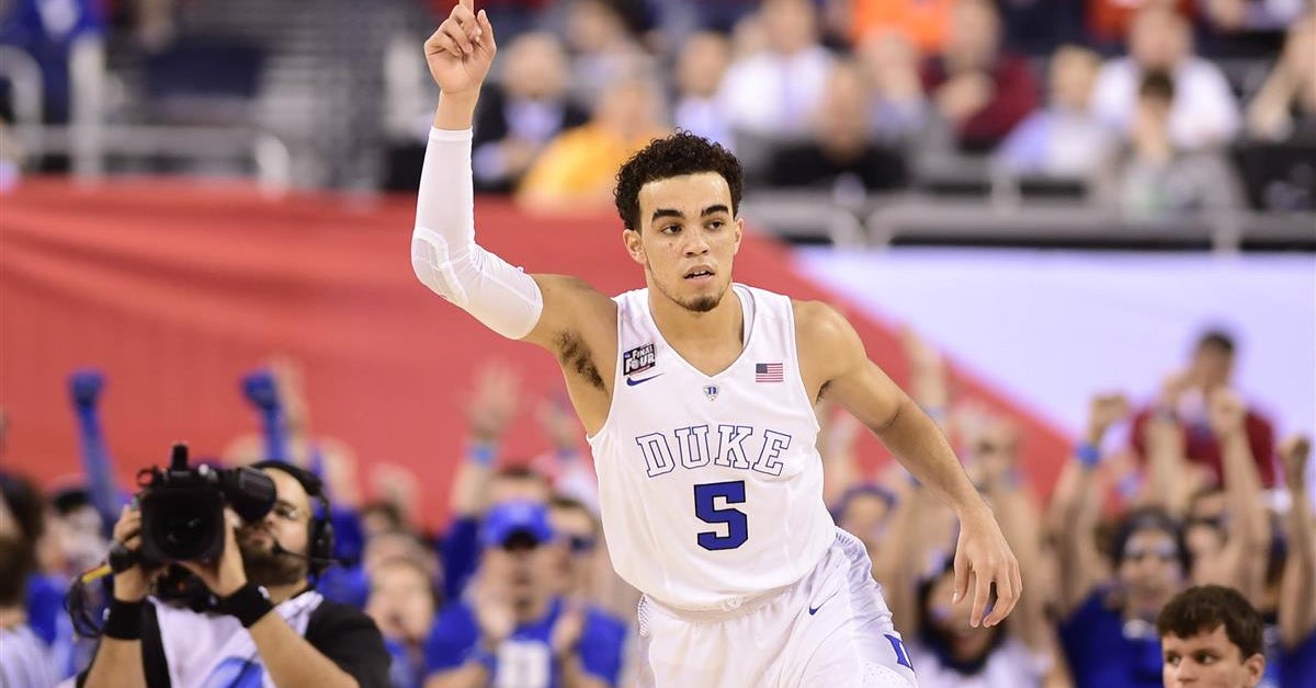 Duke's Tyus Jones gives Kevin Garnett an assist at a Twins game