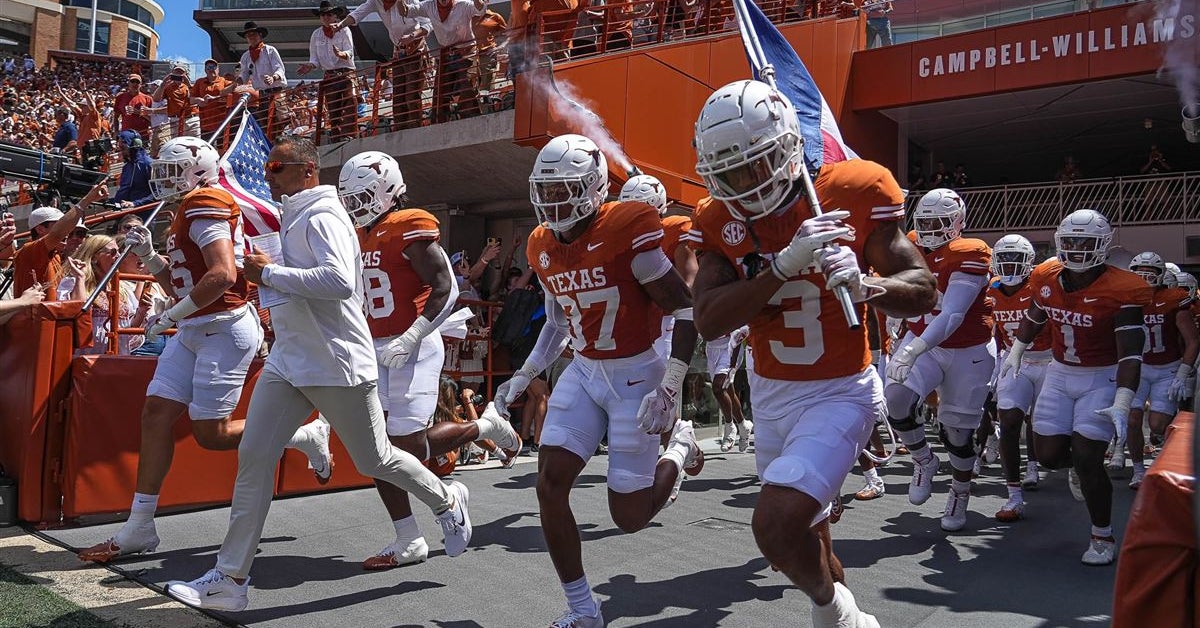 Texas opens as road favorite over Michigan in clash of college football ...