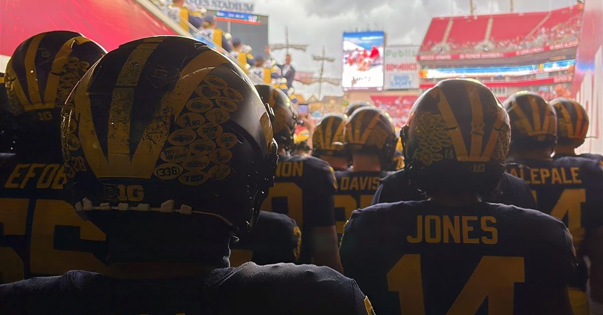 Under a darkening sky, a new band of Michigan Wolverines fell the ...
