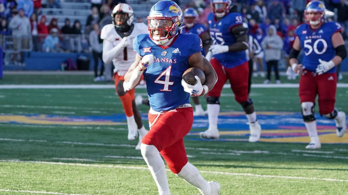 Devin Neal’s historic performance spearheads KU’s win to obtain bowl ...