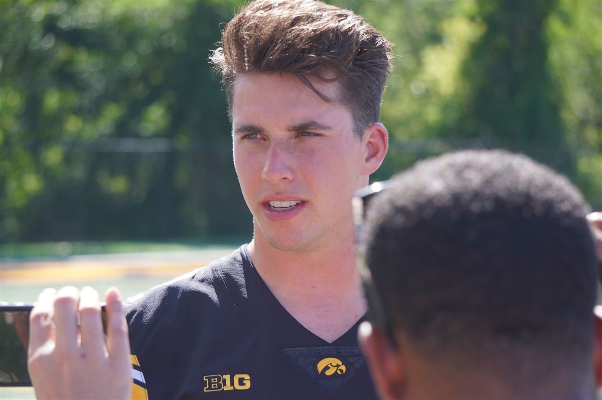 Iowa quarterback Cade McNamara leaves Iowa's open fall practice after ...