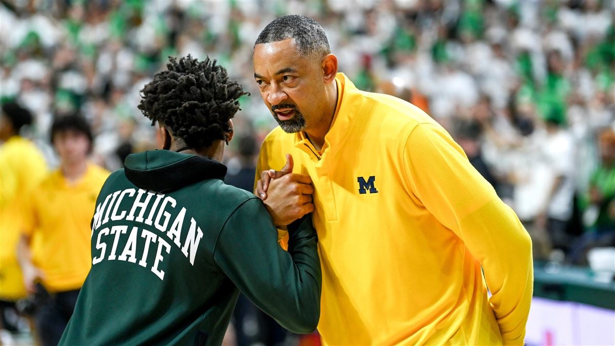 Michigan's Juwan Howard tips his cap to Michigan State HC Tom Izzo ...