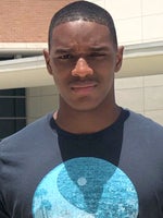 Rason Williams, Alief Elsik, Strong-Side Defensive End