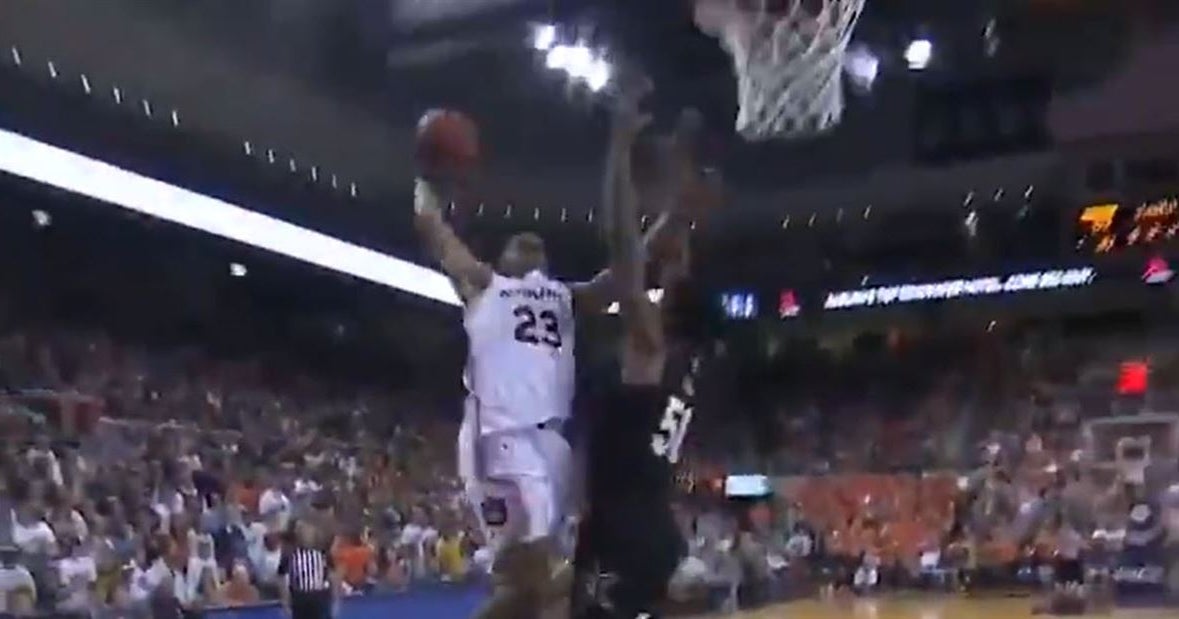 Auburn’s Isaac Okoro serves up nasty poster dunk
