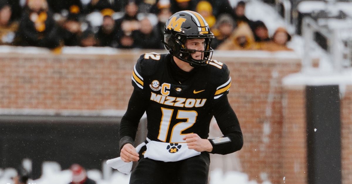 Brady Cook scores game-winning touchdown on Senior Day to give No. 21 ...