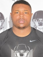 Coby Germany, Evans, Strong-Side Defensive End